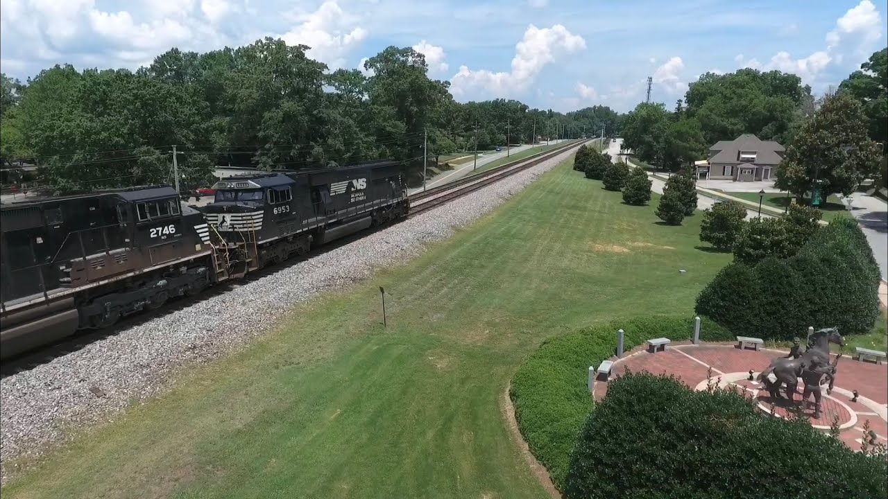 An SD60E Leads 154 Long Hood Forward and a Stack Train at Buford - YouTube