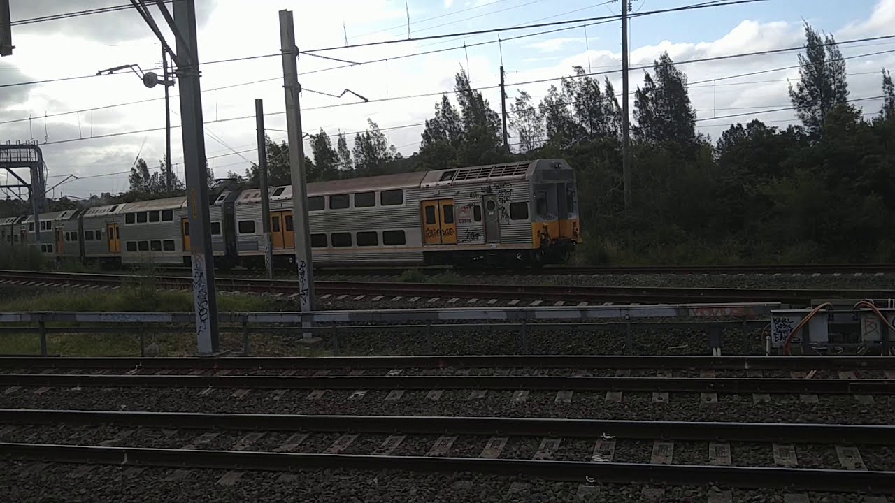 Sydney Trains C-Set Chopper train passes by non stopping Wolli Creek ...