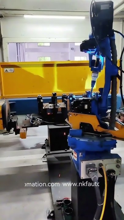 Our Three-Axis Horizontal Positioner supporting Yaskawa robot for welding automation - YouTube