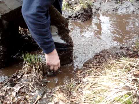Muddy boots into roll in the mud - YouTube