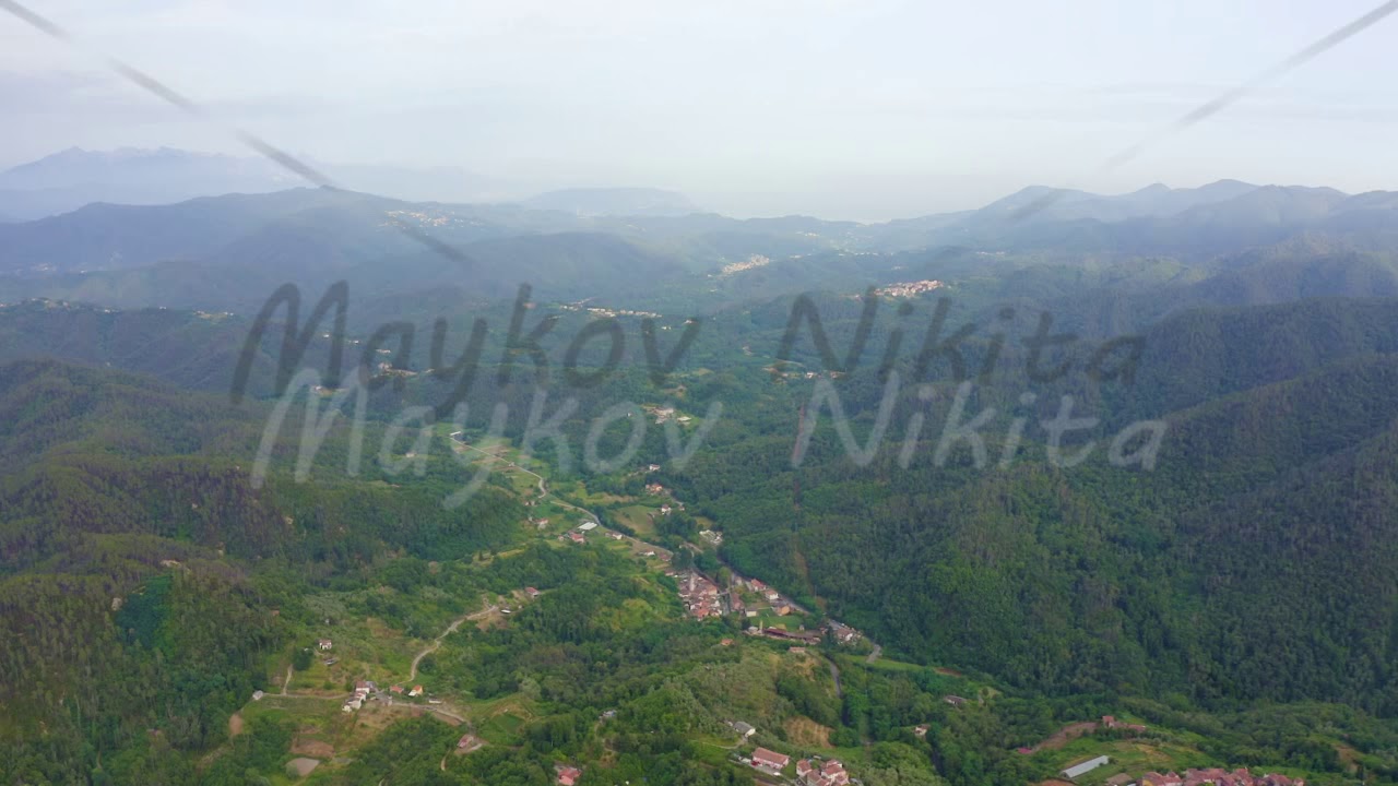 Italy. Forest covered mountains and villas. The territory of Pignone in ...