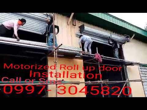 Motorized Roll up door installation - YouTube