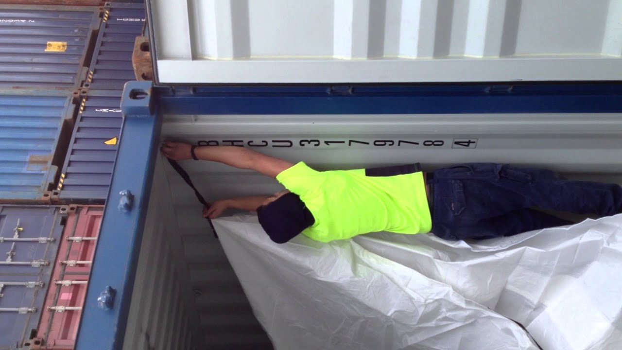 Installing Dry Container Liner 008.MOV - YouTube