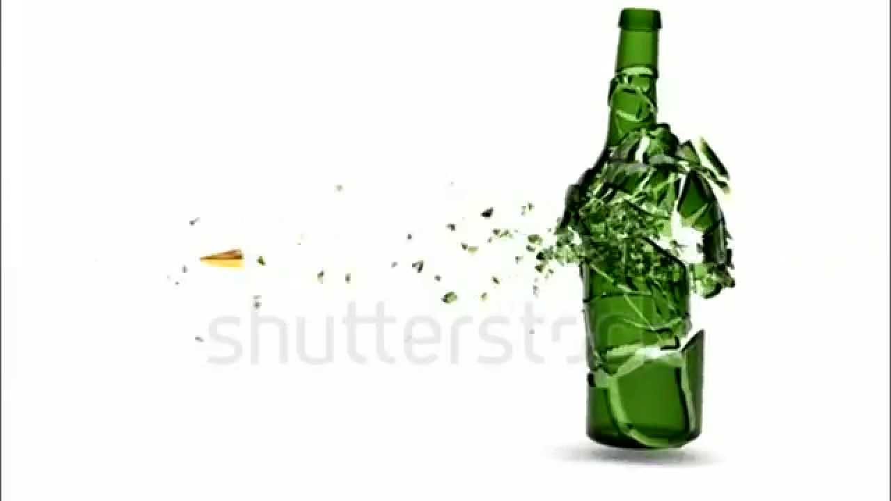 Shattered green beer bottle by bullet in slow motion with alpha channel ...