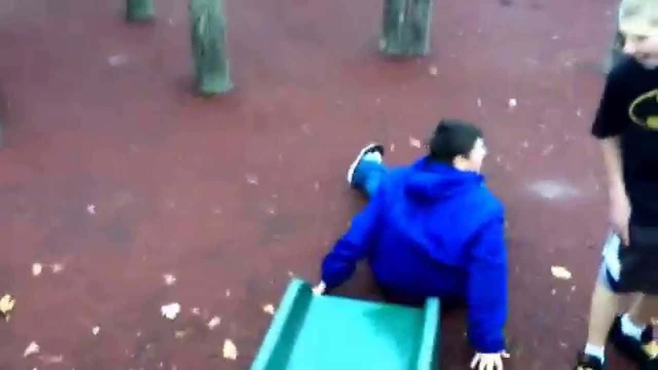 Kid Falls Down Slide ("Wind Knocker") - YouTube