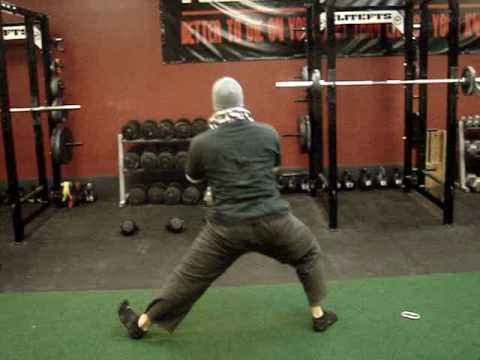Cossack Squat with Chains - YouTube