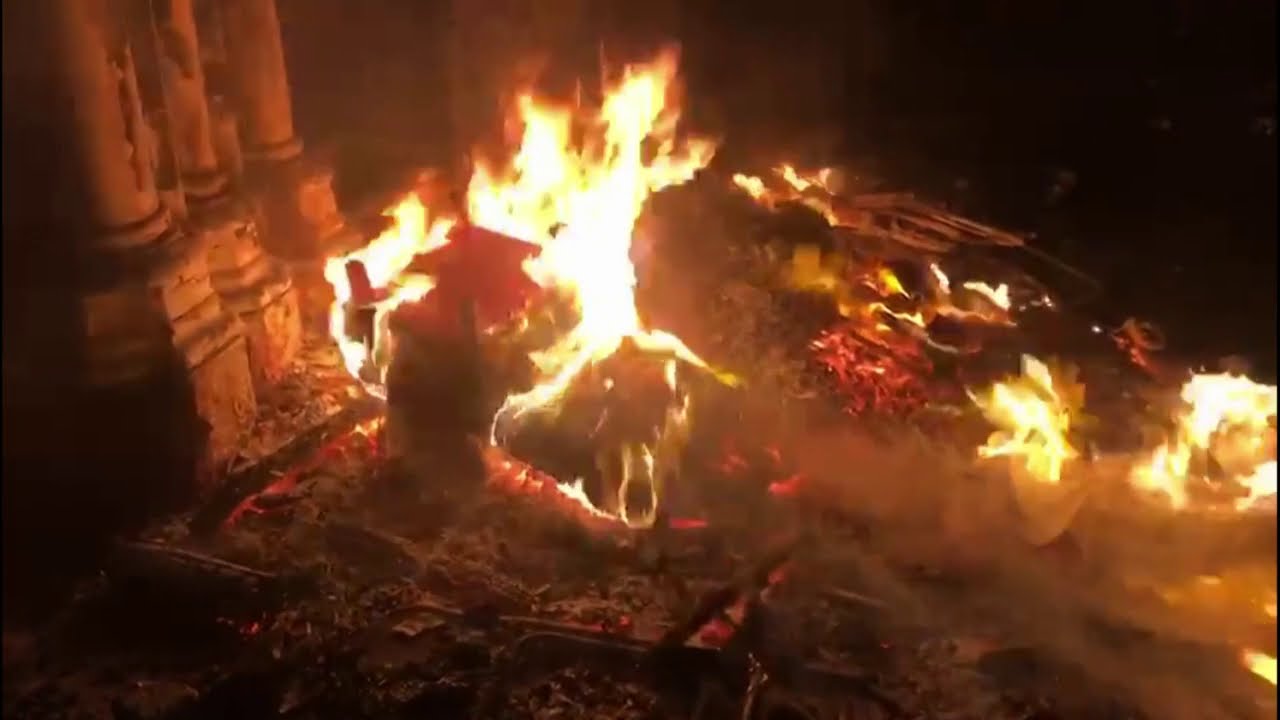 Protesters set a fire inside church in Santiago | AFP - YouTube