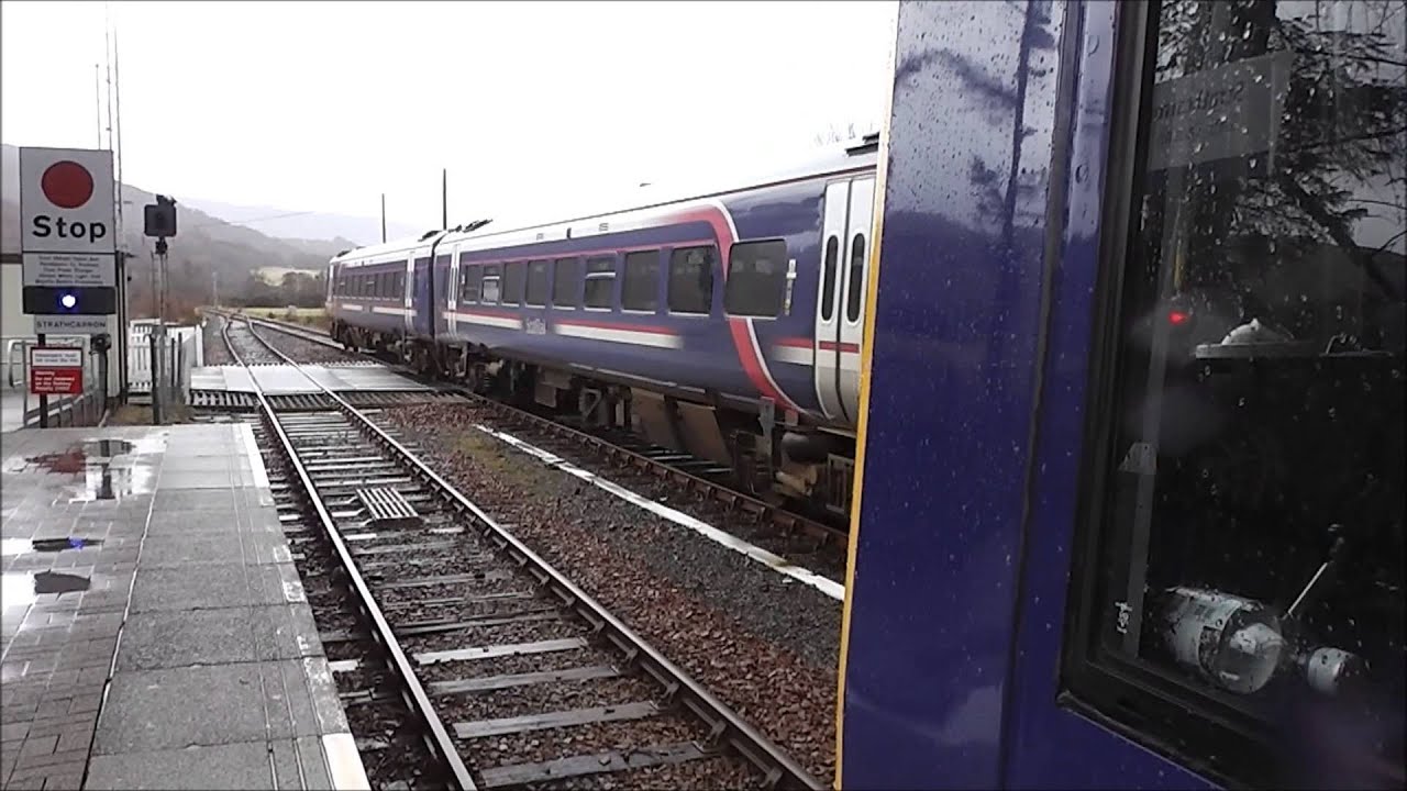 ScotRail 158724 crosses 158725 at Strathcarron on the Kyle Line - YouTube