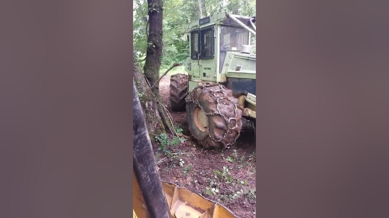 the c7 tree farmer logging after a rain - YouTube