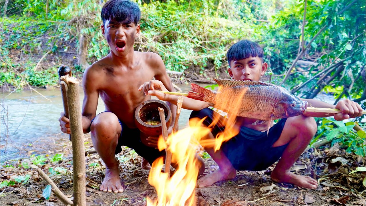 Wild people cheering for fish #wild people #primitive #cook #fish #food ...