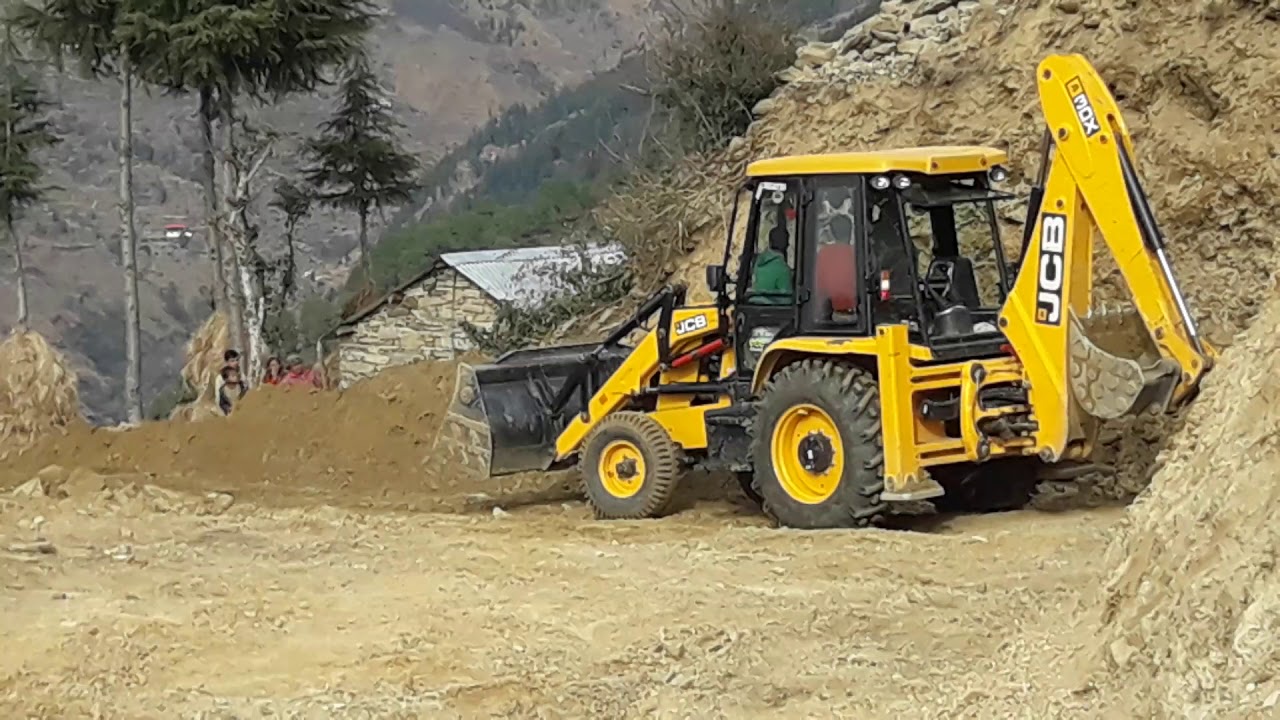 JCB Backhoe Leveling Gravel On Village Road-Backhoe Video - YouTube