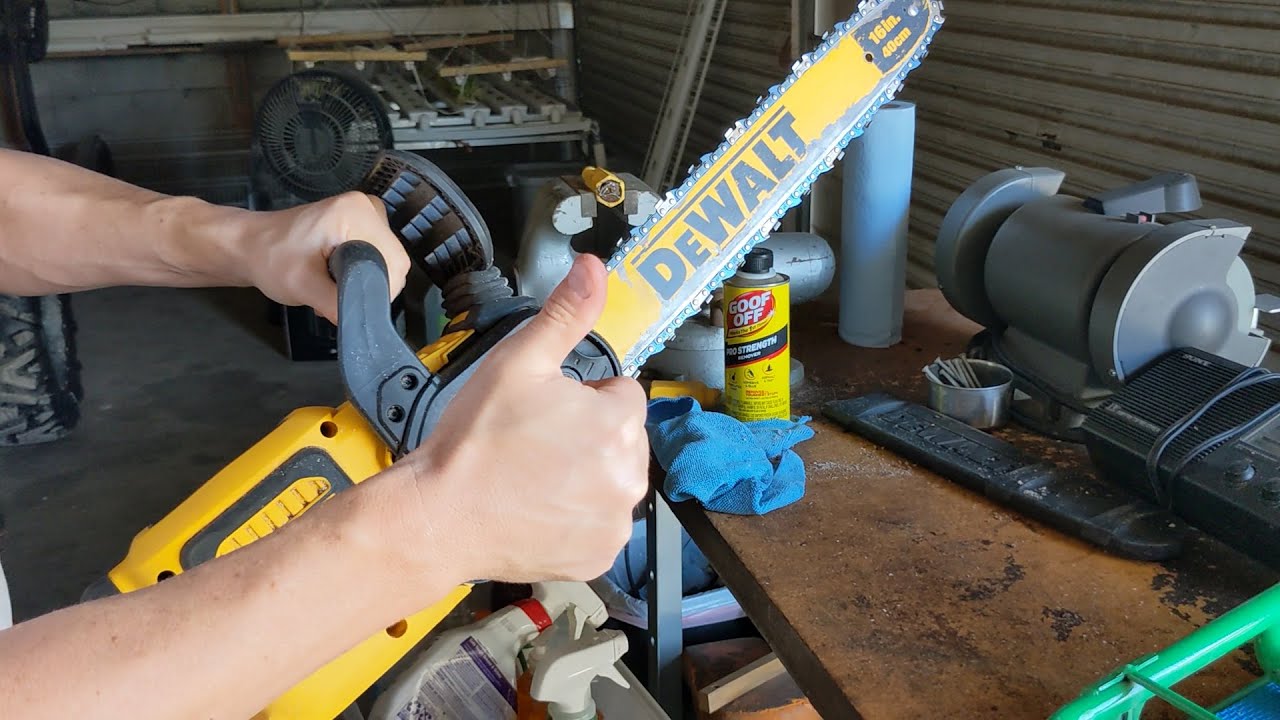 How to Replace a Chainsaw Chain / Blade on a Dewalt DCCS670X1 Or ...