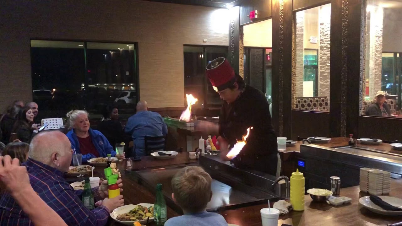Fire tricks at hibachi table - YouTube