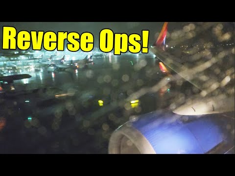 *HEAVY STORM & REVERSE OPS* Southwest Boeing 737-7H4 RUNWAY 9 Landing ...