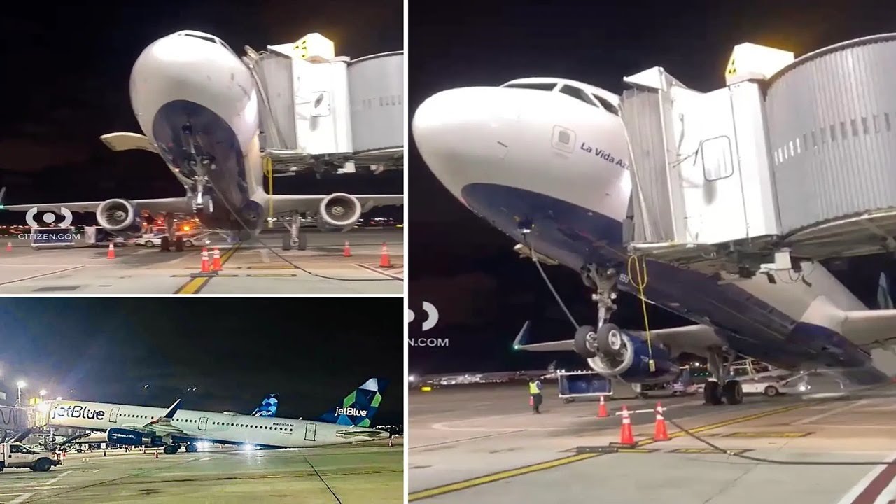 JetBlue plane tilts back while unloading at JFK Airport - YouTube