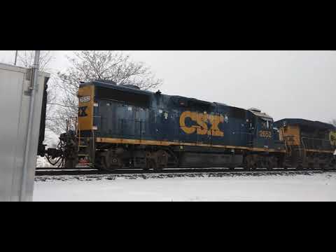 CSX 7031 leading a manifest west with EMD GP38-2 2652 - YouTube