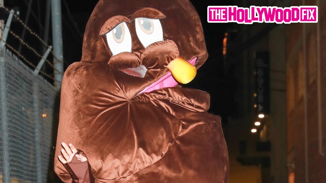 Katy Perry Rocks A Poop Emoji Costume While Greeting Fans Backstage At ...