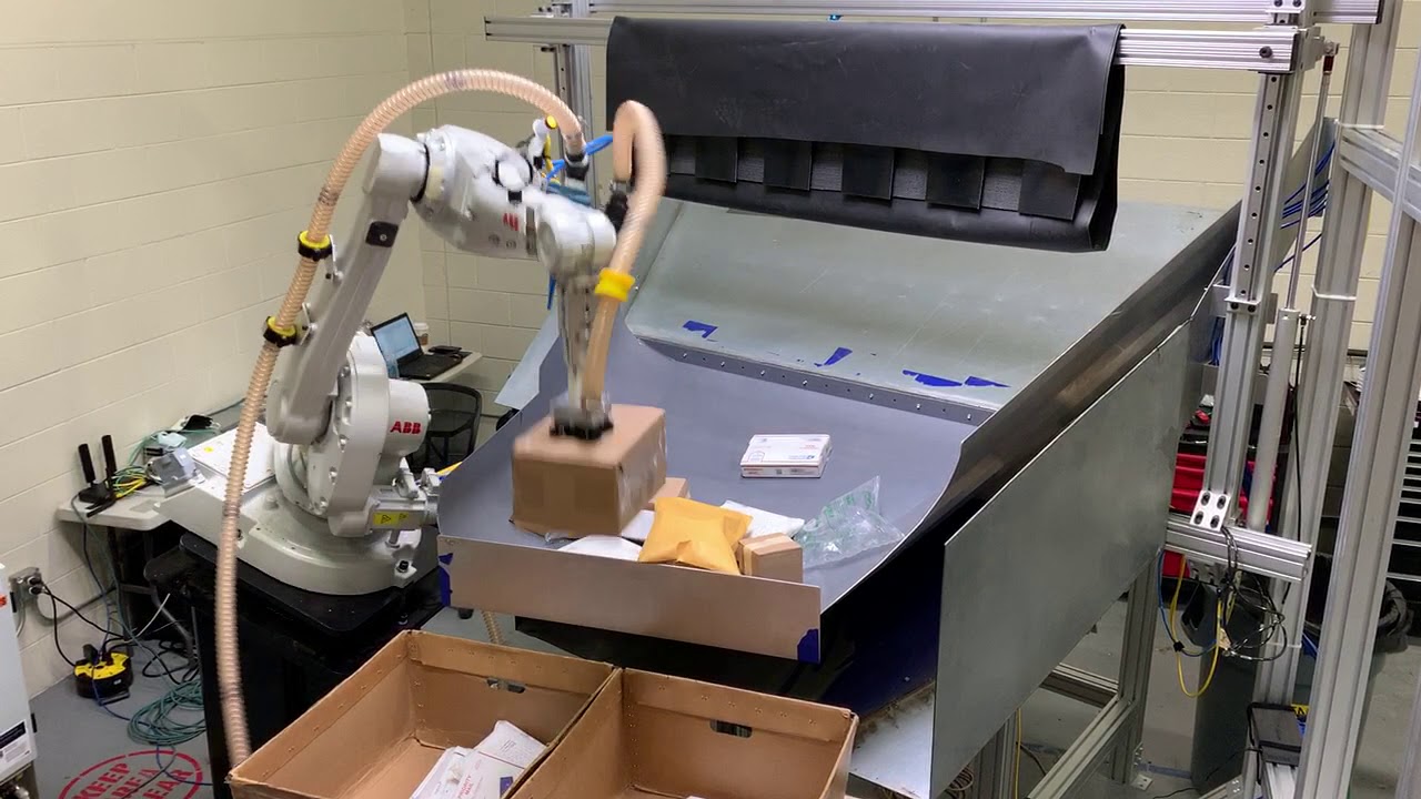 AI powered robotic parcel singulation demo - YouTube