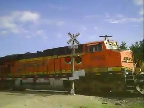 BNSF 5995 East Loaded Oil Train Meet BNSF 7555 West Empty Coke Train (5-31-2012) - YouTube