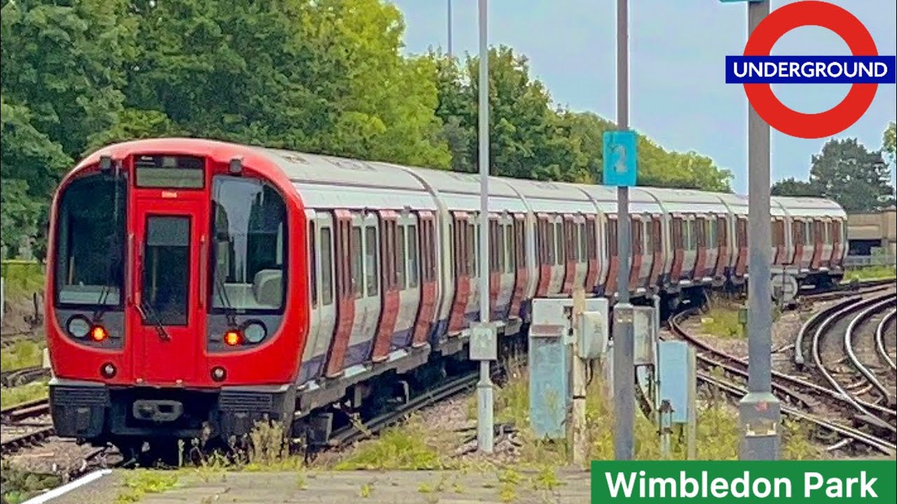 London Underground District line S7 Stock Trains at Wimbledon Park tube ...