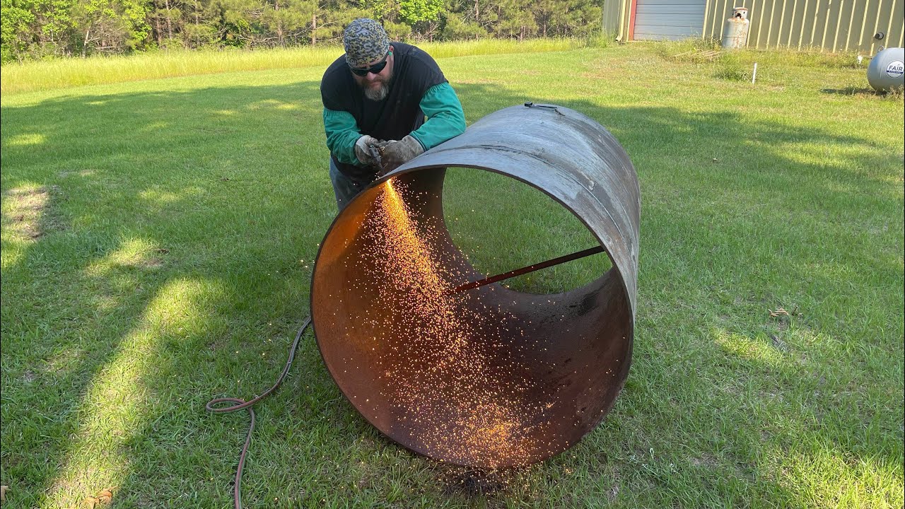 Cutting a 41” diameter propane tank & loading ashes - YouTube