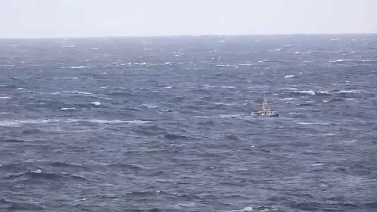 Fishing boat in rough water - YouTube