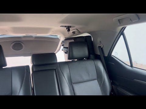 How to close fortuner back door by sitting inside - YouTube