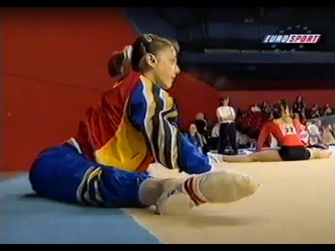 Russian gymnasts flexible girls stretch on the training