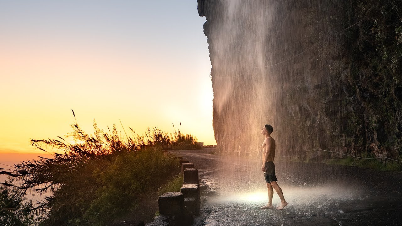 A Waterfall on a road // Madeira - Joel Friend