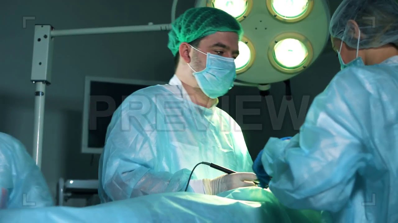 Surgeons In Operating Room Stock Video - YouTube