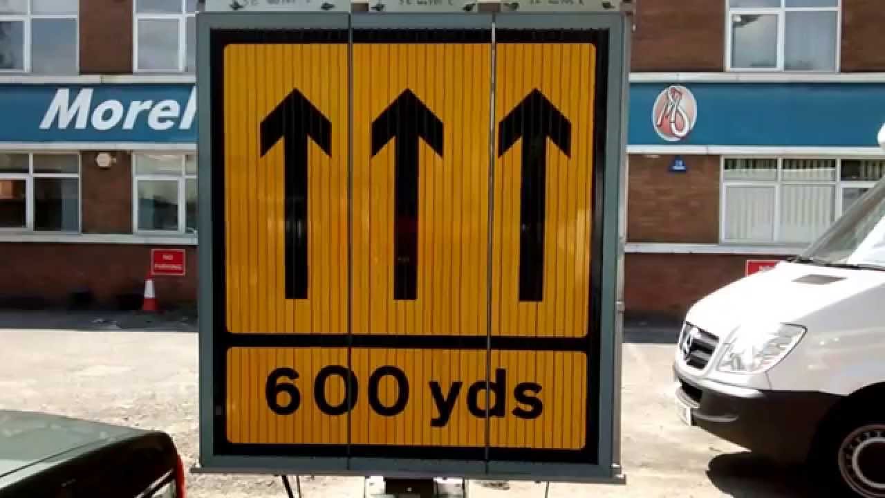 Morelock Signs Rotating Prism Sign - YouTube