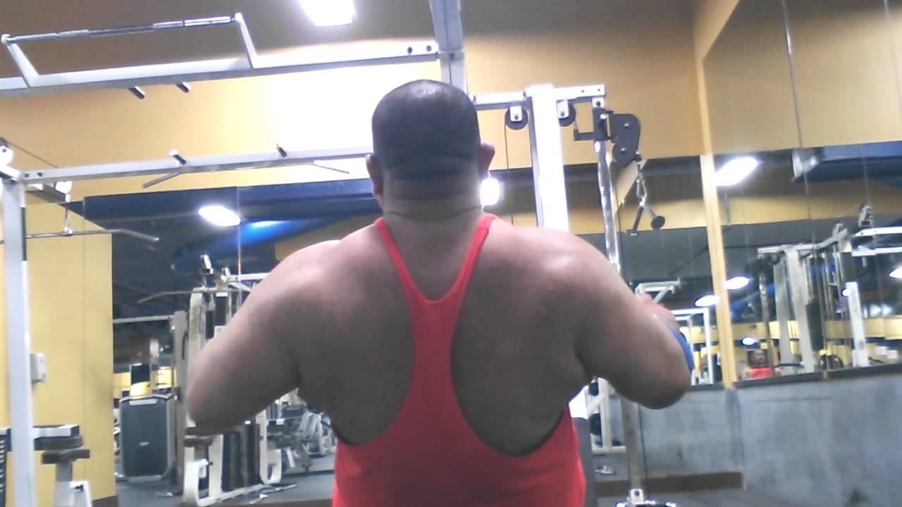 Seated wide-grip cable rows - YouTube