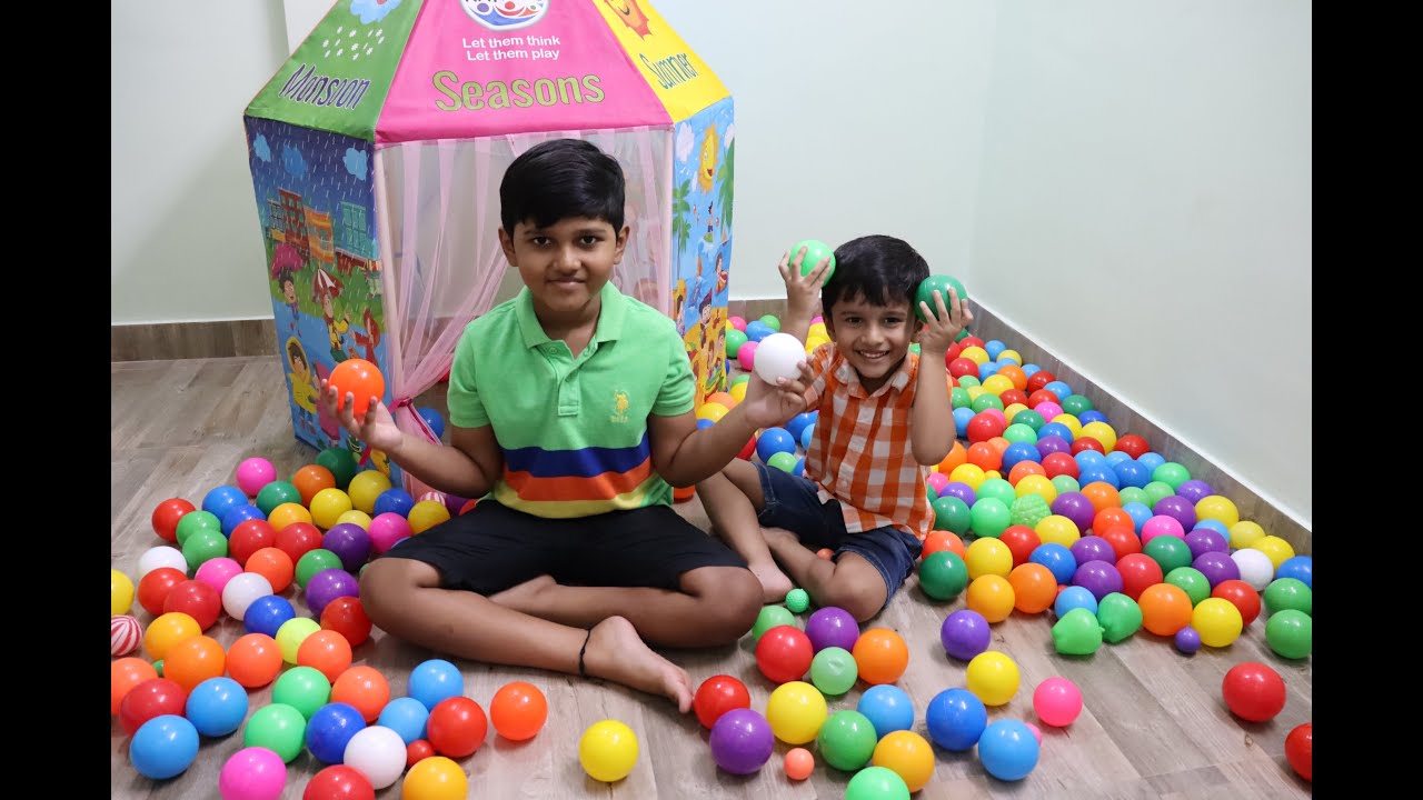 Kids Playing With Color Balls. color balls for kids. children's play ...