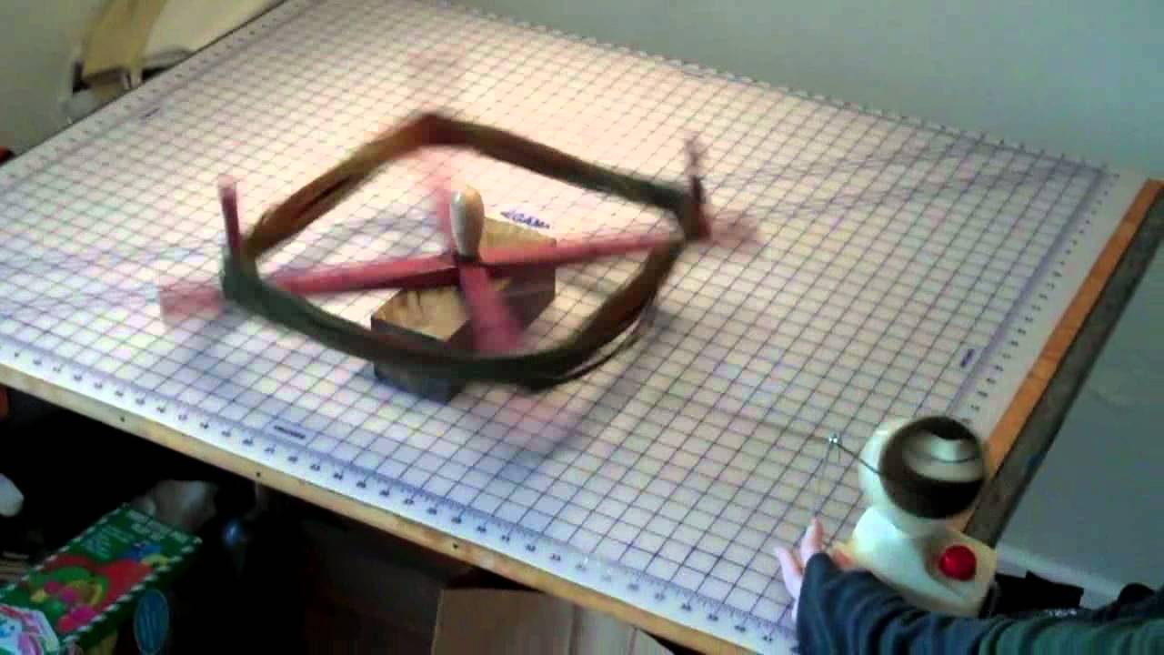 Using a homemade knock-down yarn swift and baller to make a cake - YouTube