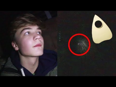 (SAW DEMON) POINTING THE CAMERA THRU OUIJA BOARD PLANCHETTE *DO NOT TRY ...