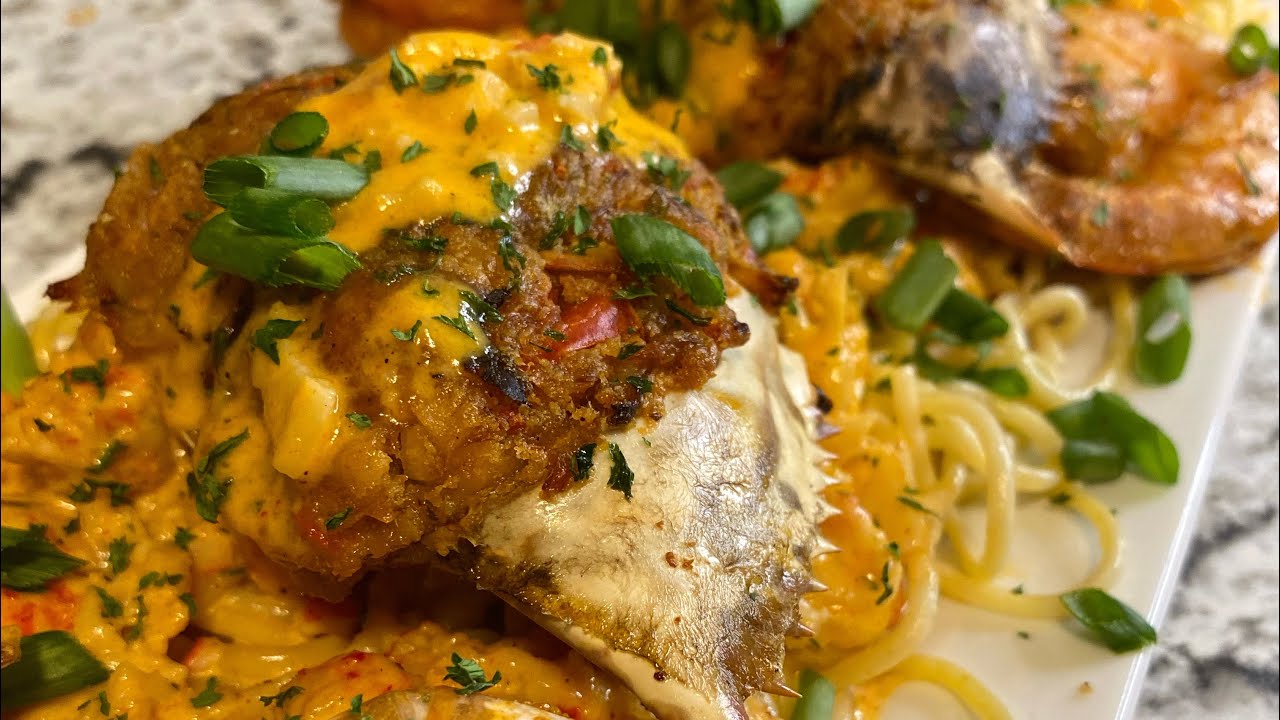 Stuffed crab platter with a Cajun Creamy crawfish pasta and jumbo ...