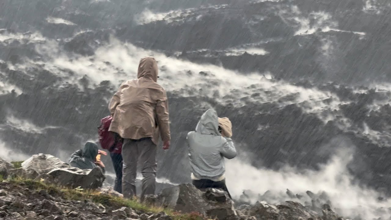 Intense steaming around the eruption, as heavy rain hits the lava. 25. ...