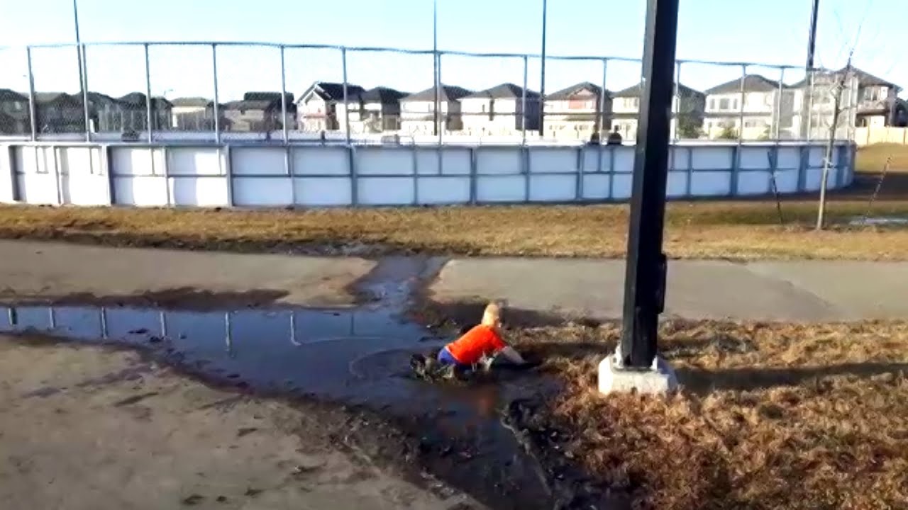 Young Boy got stuck in the mud and survive. - YouTube