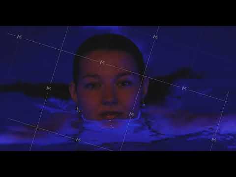 Swim of Bikini Girl Close-up in Swimming Pool With Neon Lights at Night