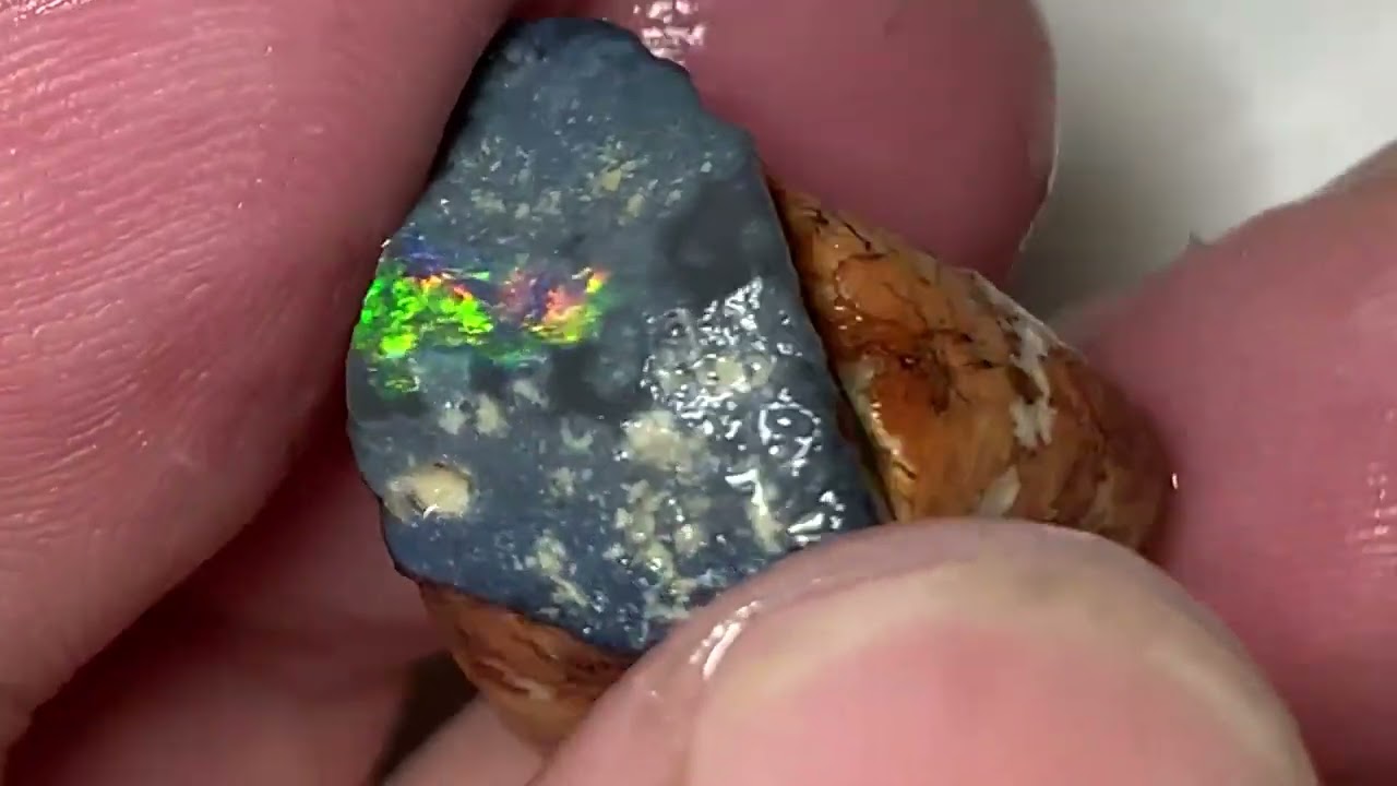 Untouched Seam opal formation with black potch showing Vibrant exposed ...