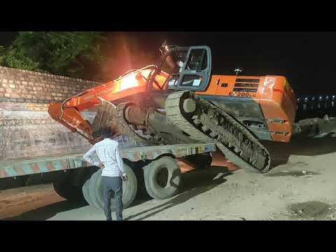 TATA Hitachi excavator loading Trailer