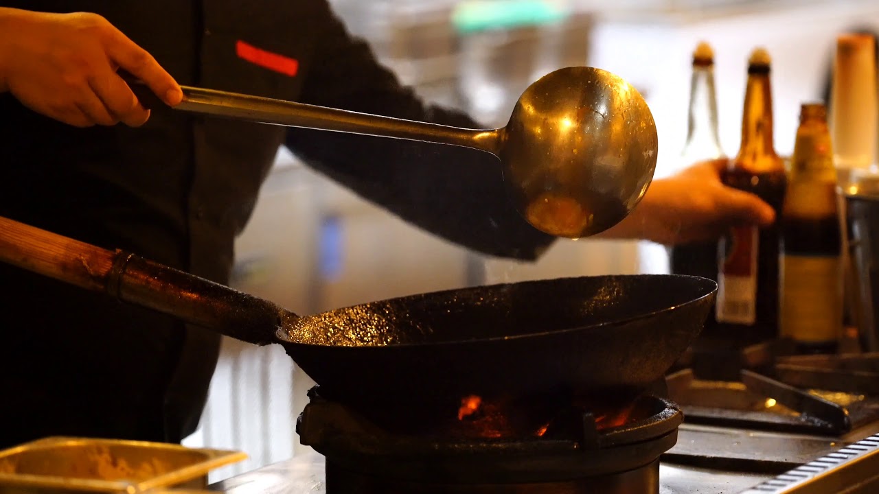 A Cook Using A Wok - YouTube