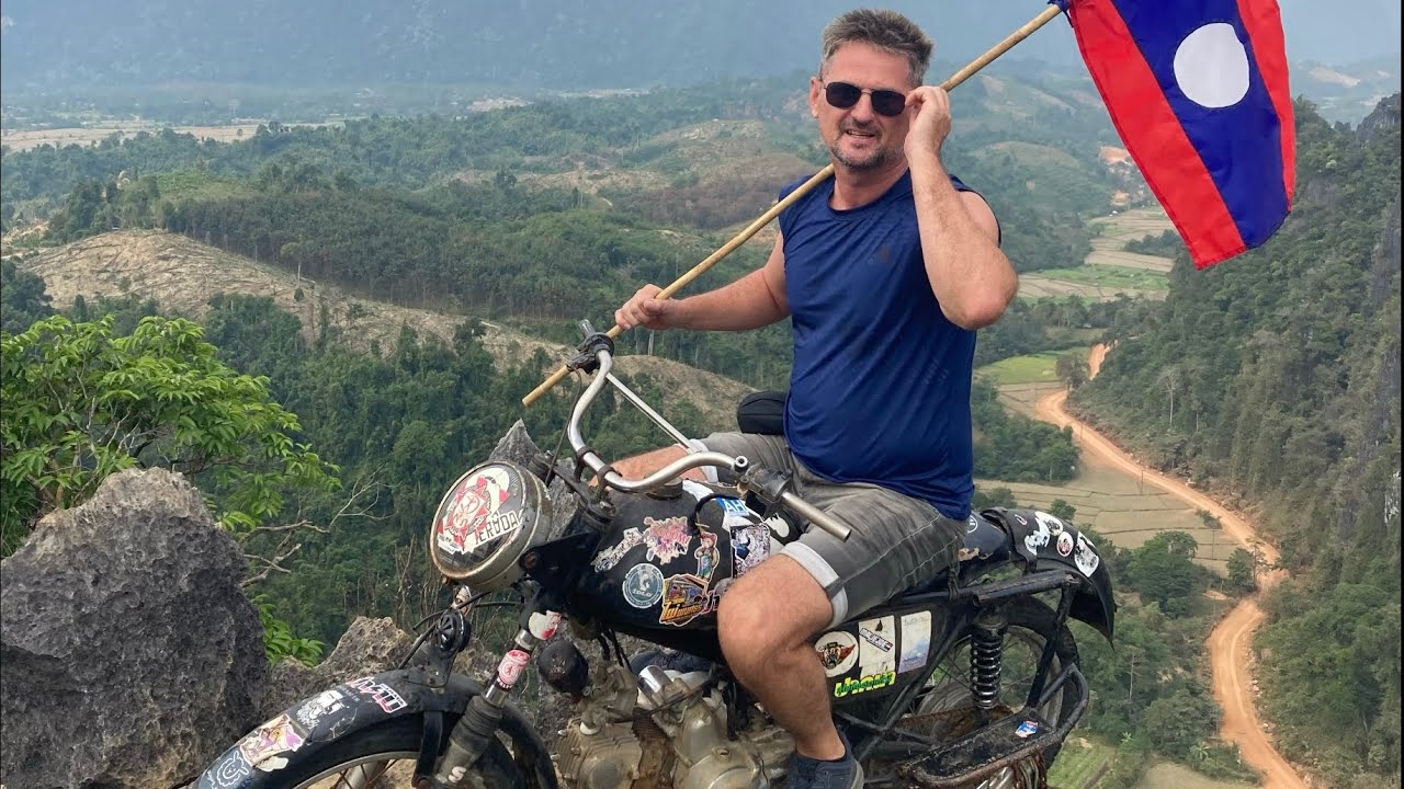 Motorbike on a mountain peak. Nam Xay Viewpoint, Vang Vieng, Laos 🇱🇦 ...