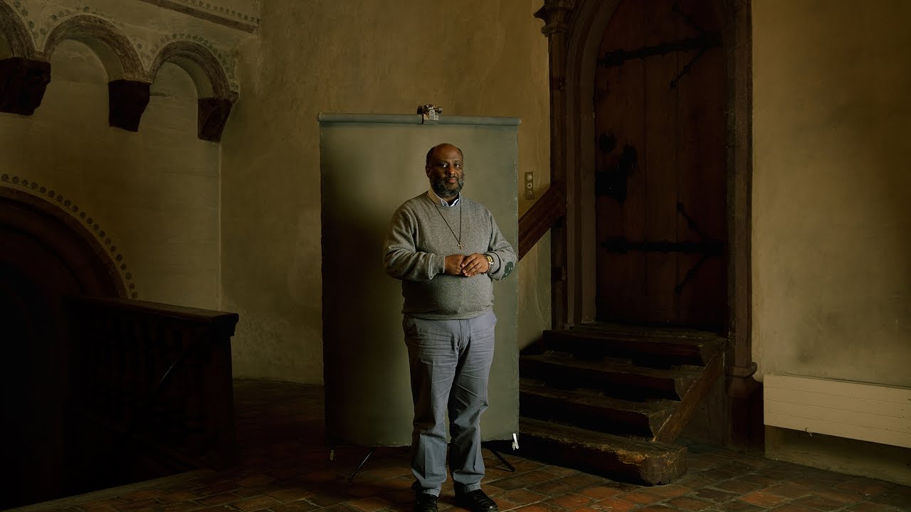 Portrait Sitting Father "Abba" Mussie Zerai - Gabriel Hill - Behind the ...