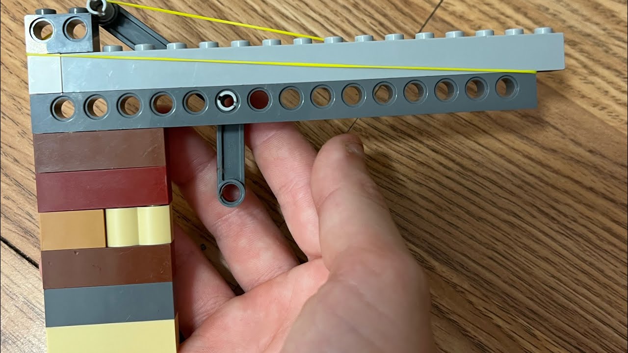 This is how to build a basic and easy Lego gun! You will need rubber ...