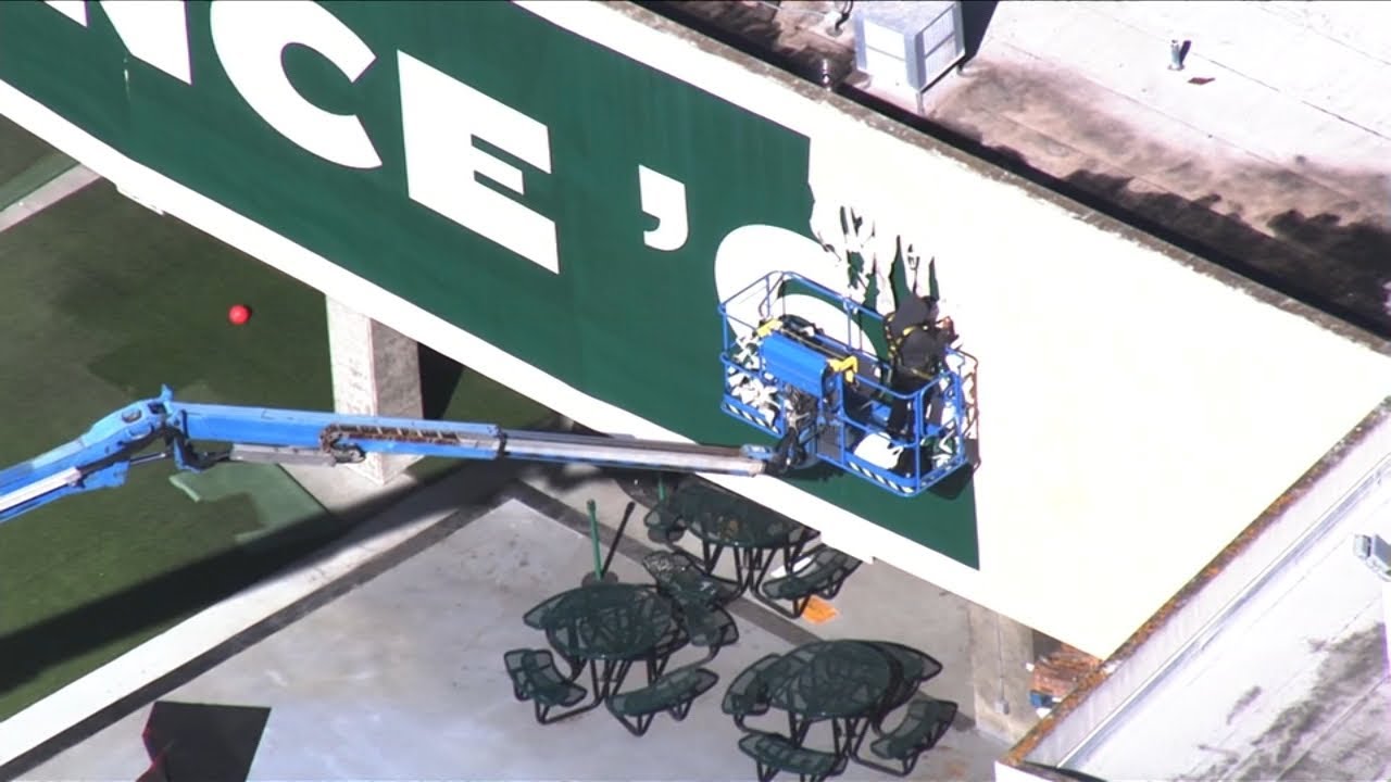 A's remove 'Rooted in Oakland since '68' sign at Coliseum - YouTube