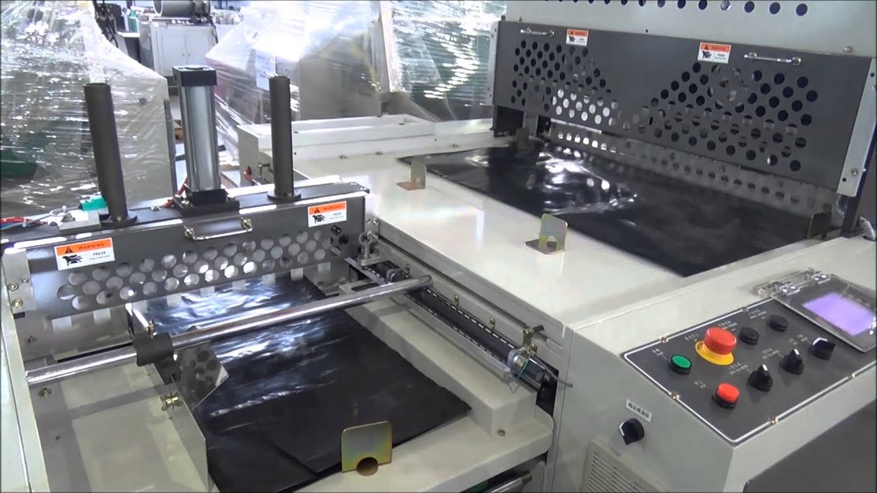 Heavy duty folded garbage bags making machine - YouTube