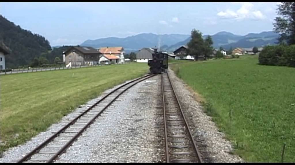 railroad trains - Bregenzerwaldbahn at work in scenic landscape of ...