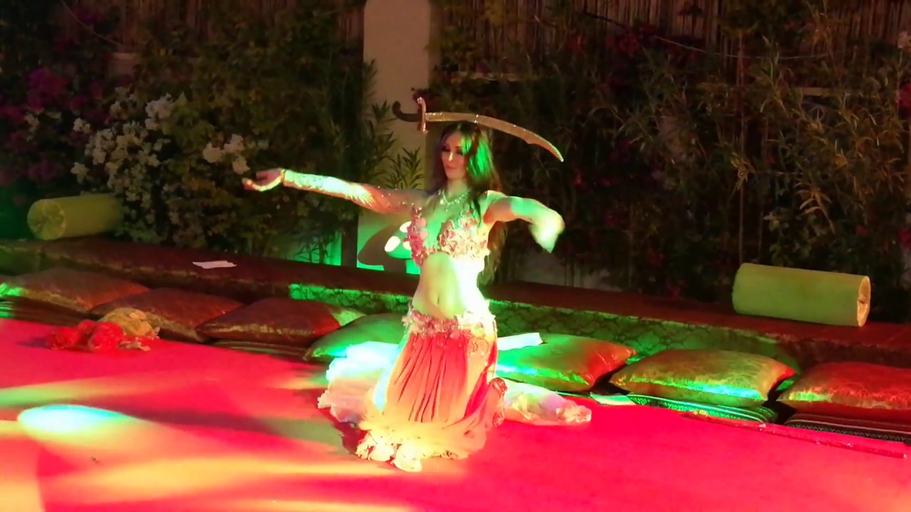 Eve belly dancer in Dubai with sword HD - YouTube