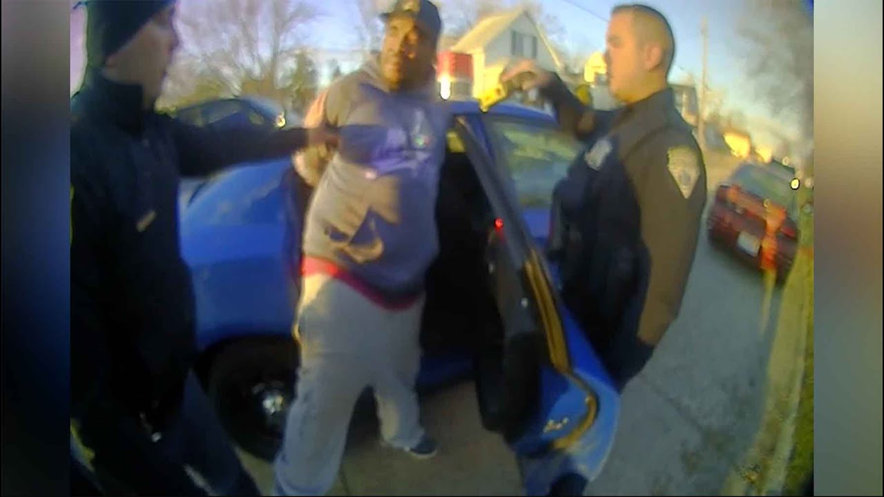 Police body cams show Michigan State Police trooper punching handcuffed ...